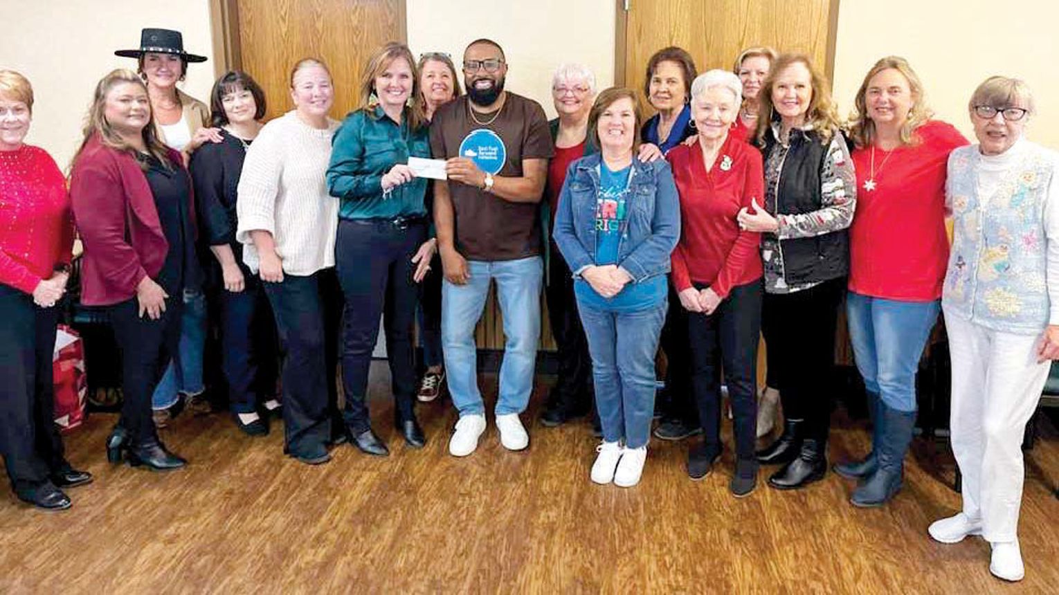 TAYLOR AREA BUSINESS WOMEN DONATION TO PROVIDE SHOES FOR KIDS IN NEED